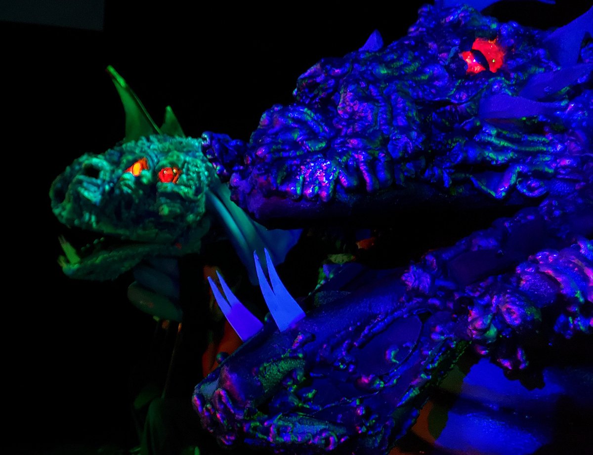 Illuminating Monsters On Stage In A Saturated Color Scheme